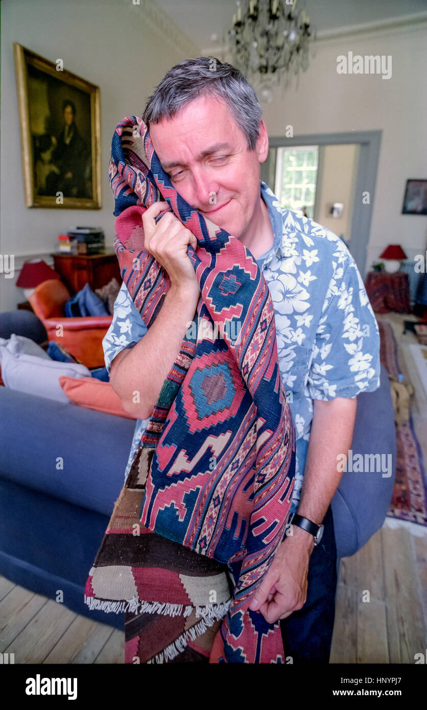 Griff Rhys-Jones at his home in Fitzroy Square, London, demonstrating ...