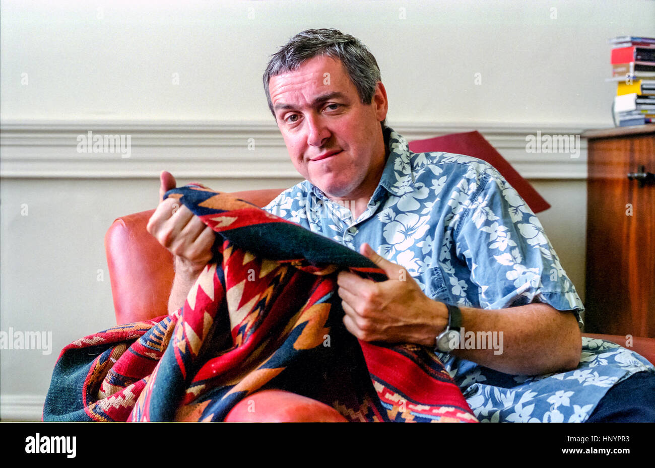 Griff Rhys-Jones at his home in Fitzroy Square, London, demonstrating ...