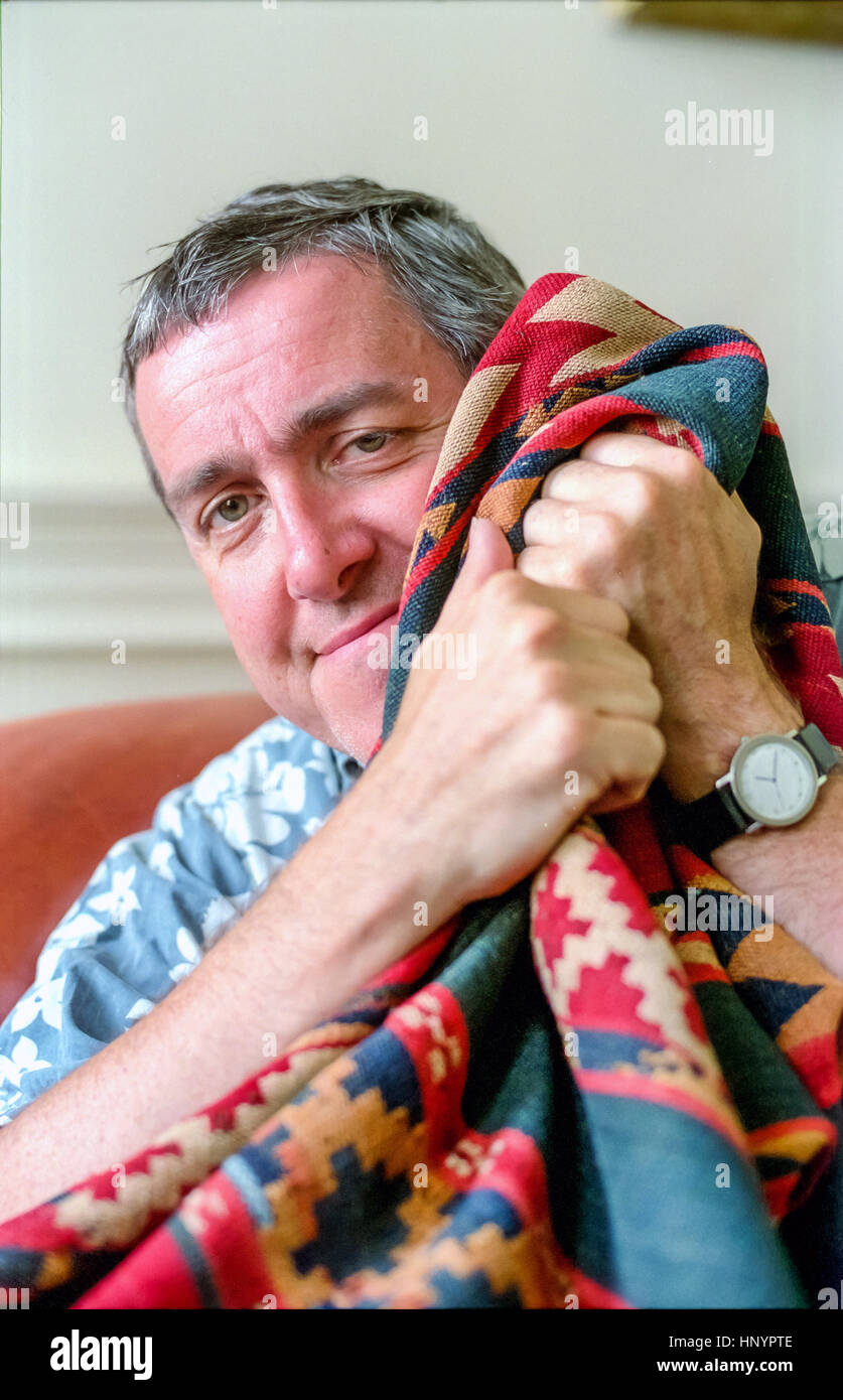 Griff Rhys-Jones at his home in Fitzroy Square, London, demonstrating ...