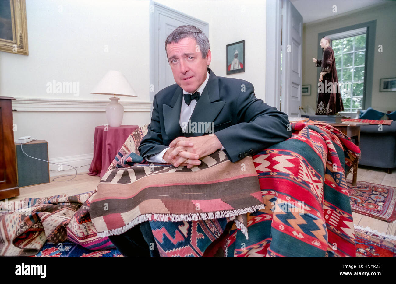 Griff Rhys-Jones at his home in Fitzroy Square, London, demonstrating ...