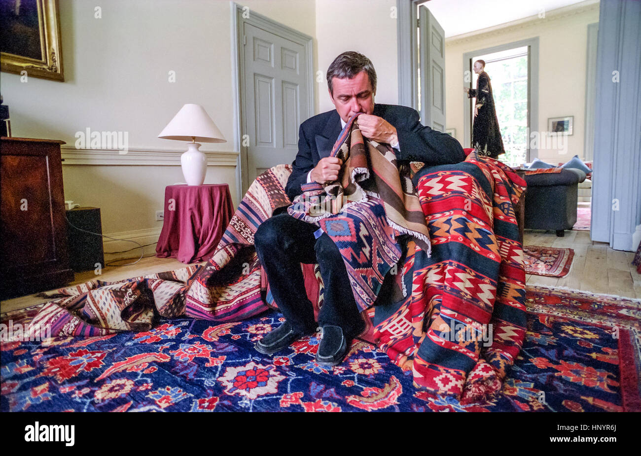 Griff Rhys-Jones at his home in Fitzroy Square, London, demonstrating ...
