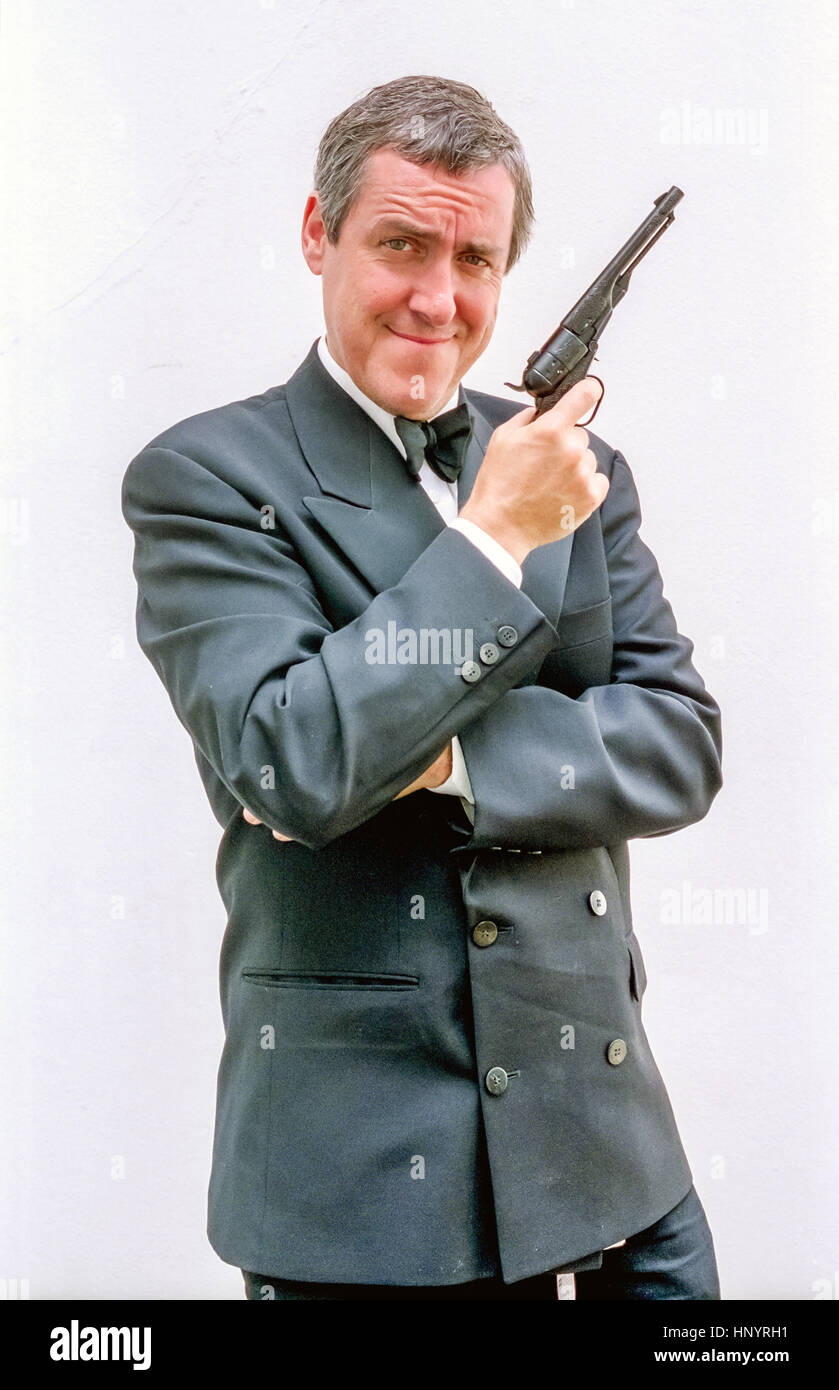 Griff Rhys-Jones at his home in Fitzroy Square, London, demonstrating ...