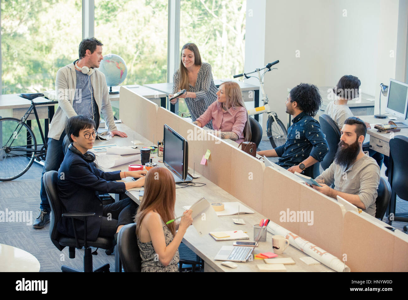 Designers working in casual office Stock Photo - Alamy