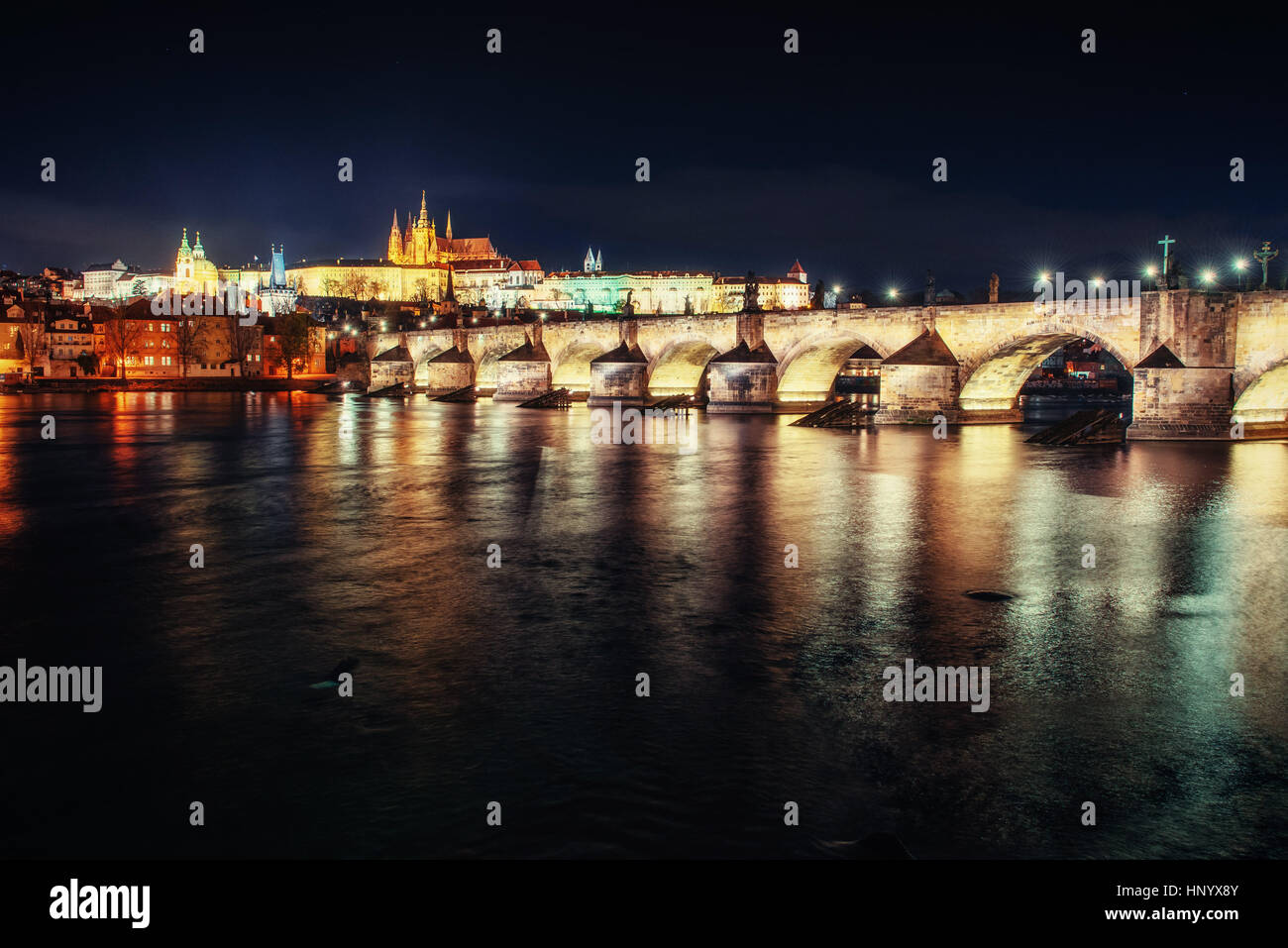 Prague Castle and Charles Bridge in the night Stock Photo - Alamy