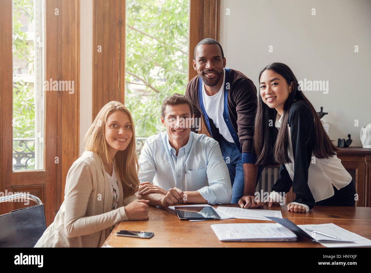 Team professionals collaborating in hi-res stock photography and images ...