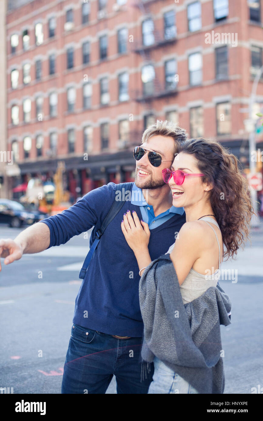 Couple exploring city together Stock Photo - Alamy