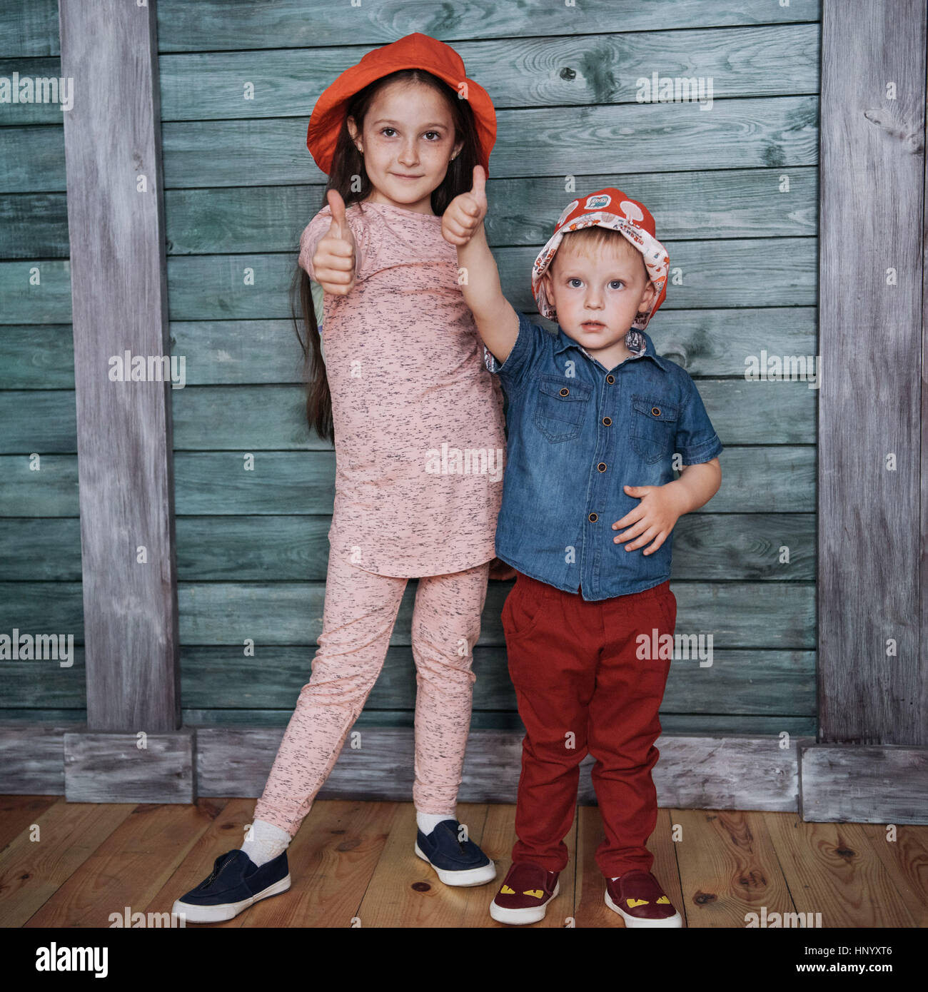 Happy young children siblings Stock Photo - Alamy