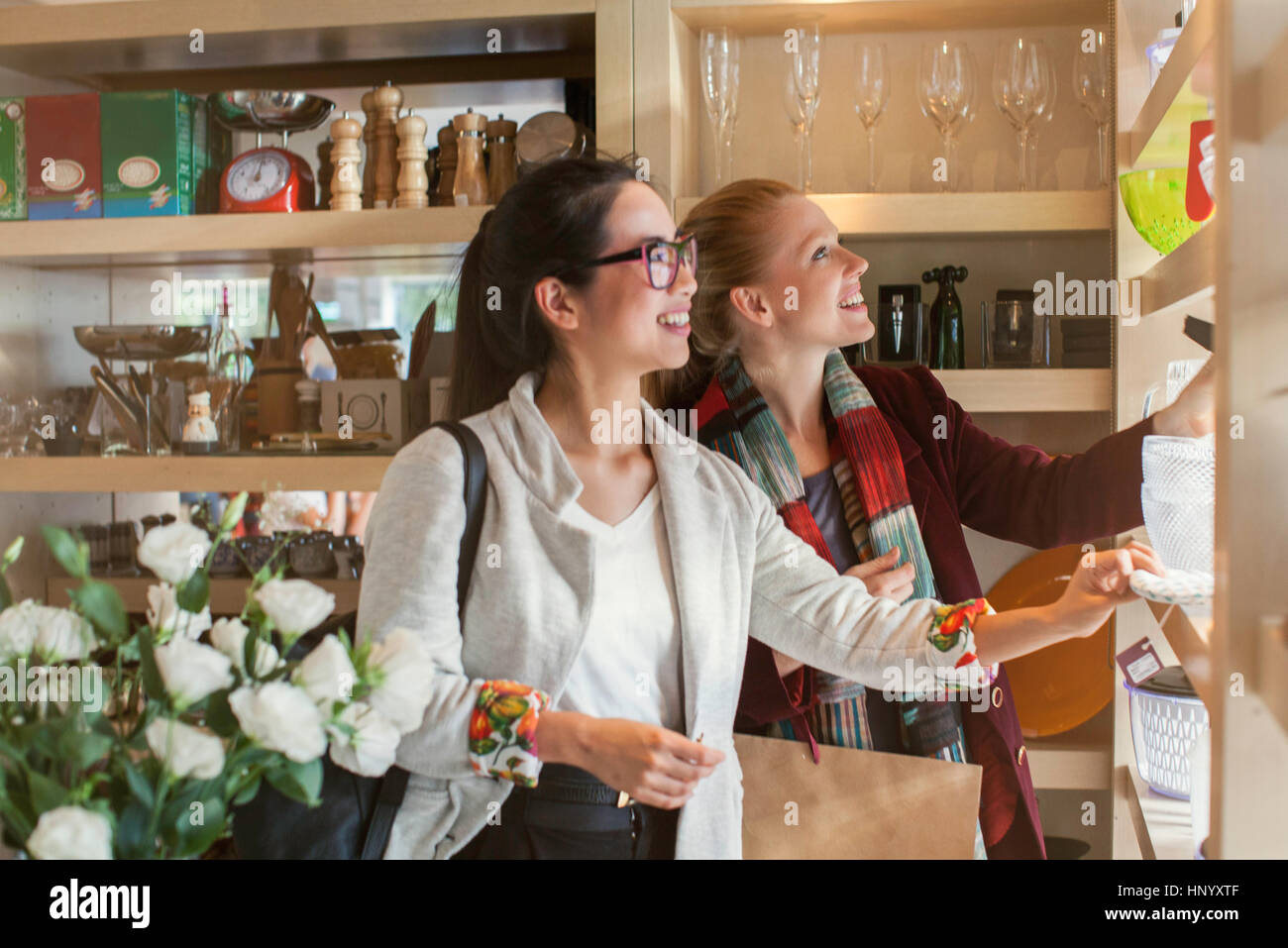 Women shopping together Stock Photo - Alamy