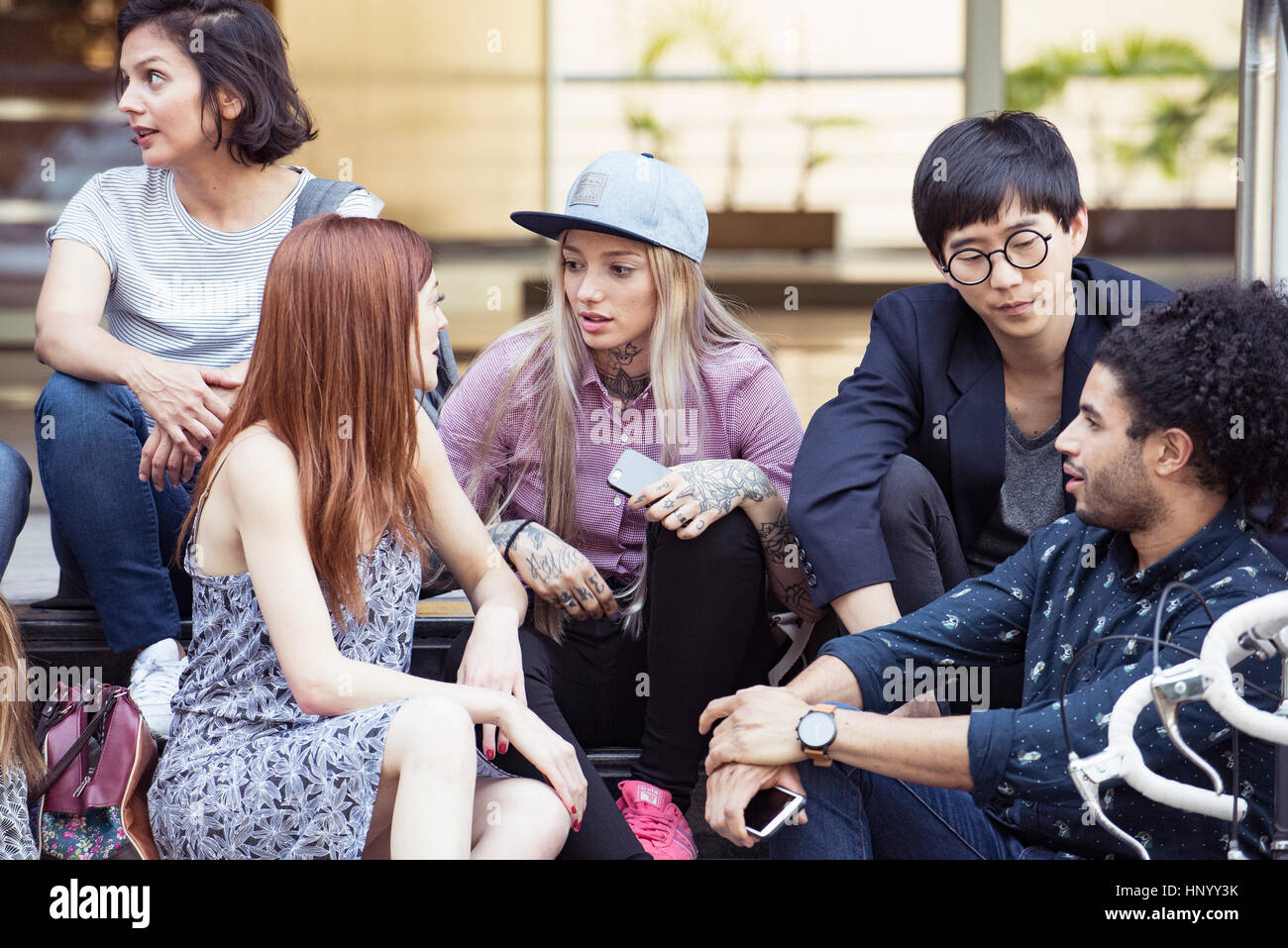 College students chatting together outdoors Stock Photo - Alamy