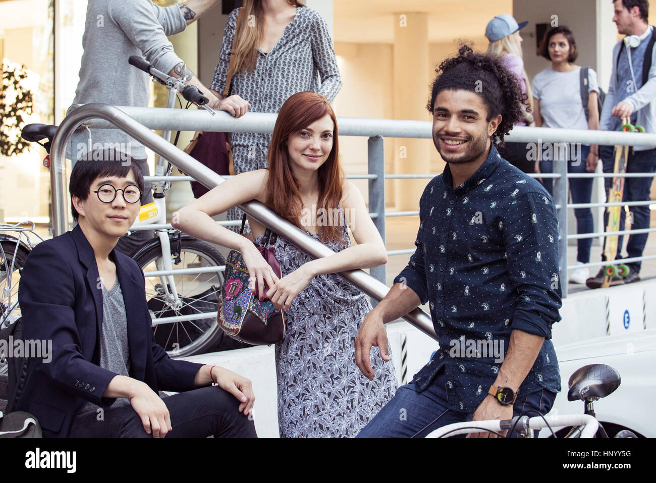 College students taking a break outdoors Stock Photo - Alamy