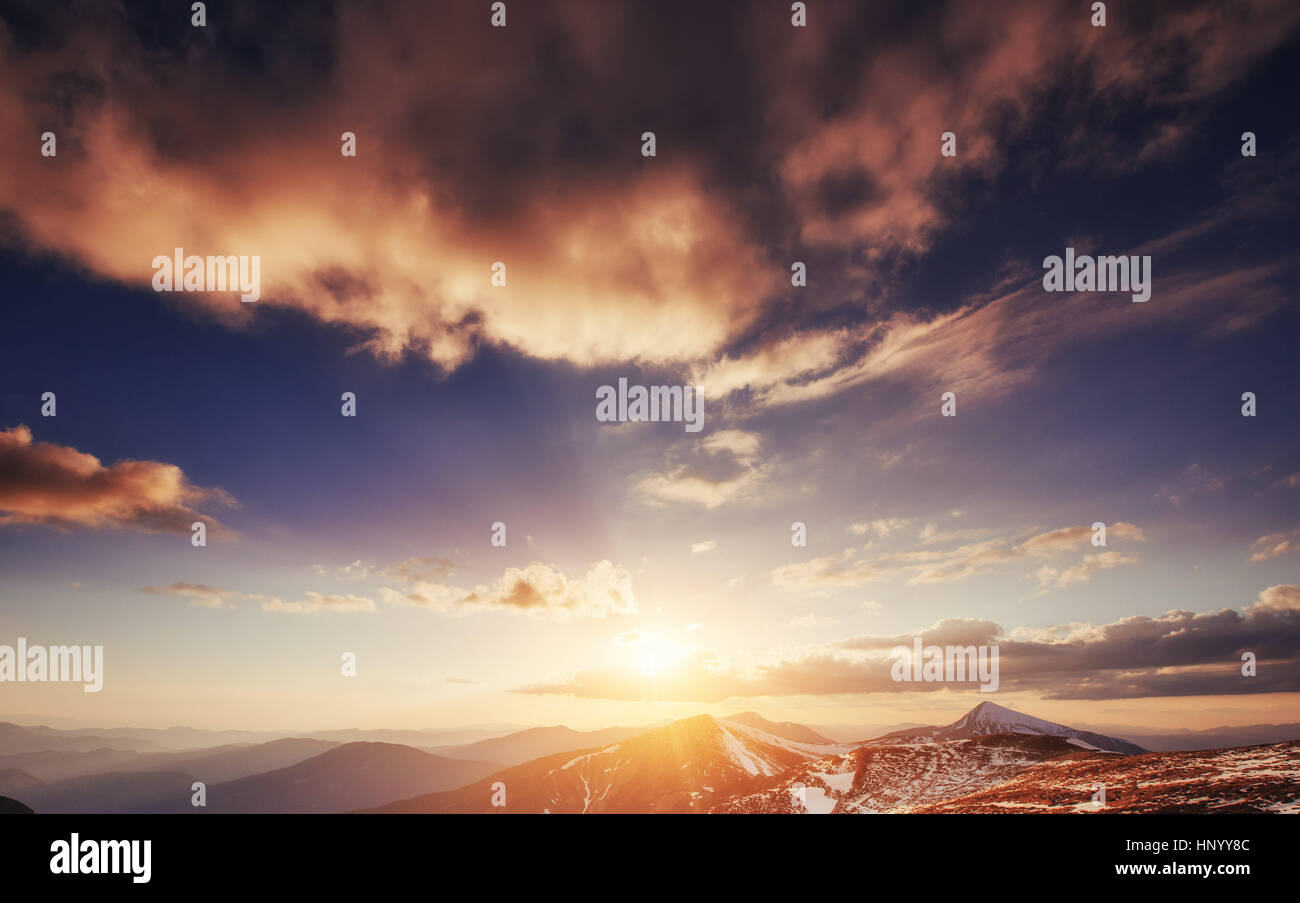 Colorful spring sunset over the mountain ranges in the national Stock ...