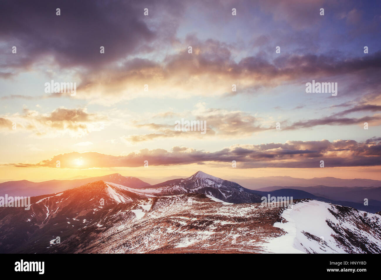 Colorful spring sunset over the mountain ranges in the national Stock ...