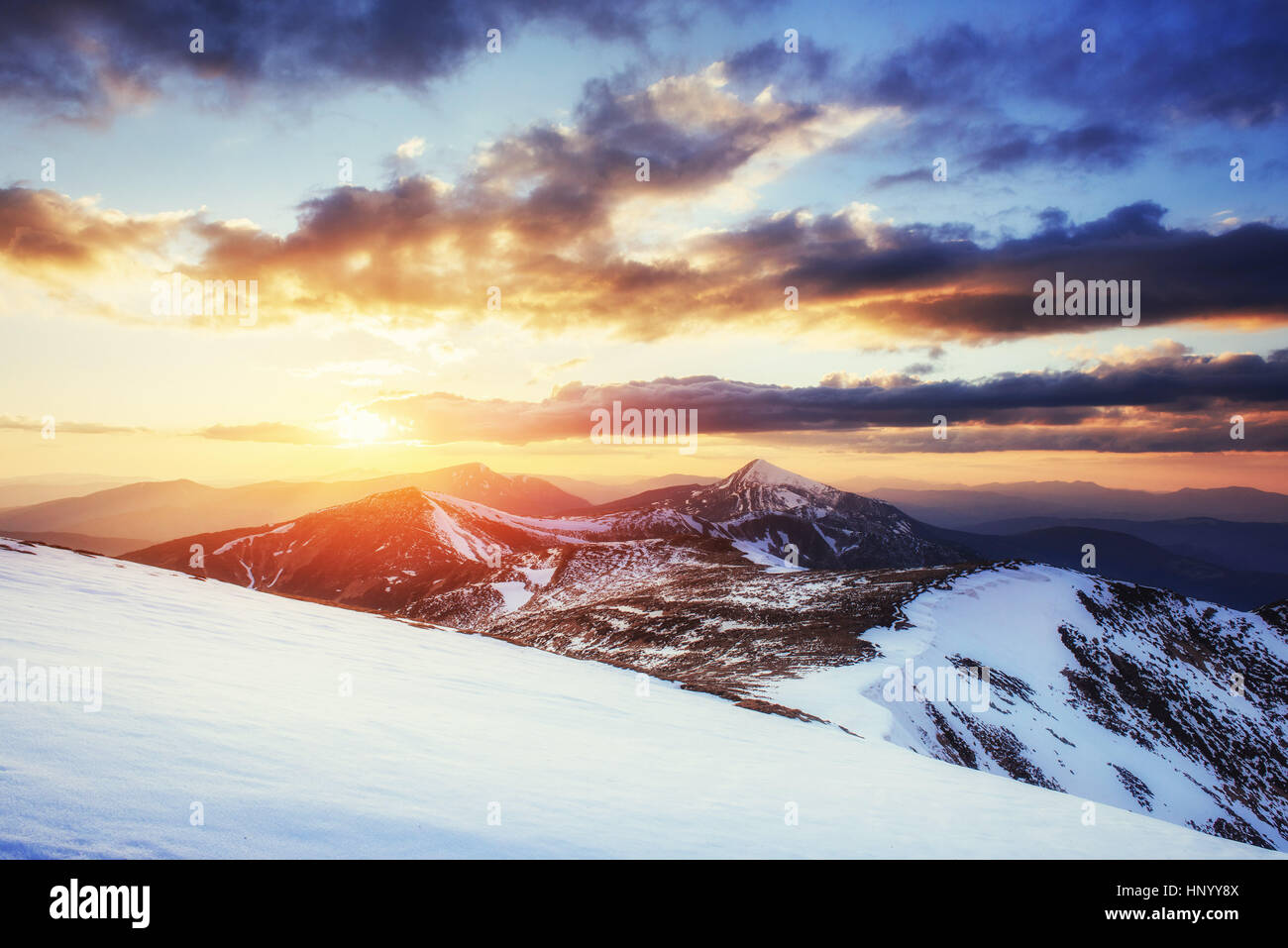 Colorful spring sunset over the mountain ranges in the national Stock ...