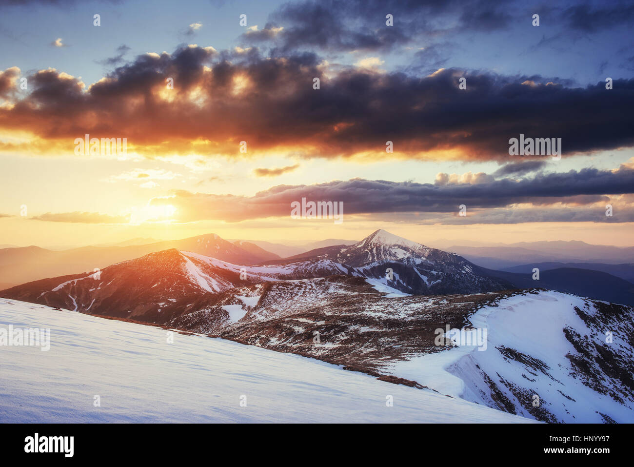 Colorful spring sunset over the mountain ranges in the national Stock ...