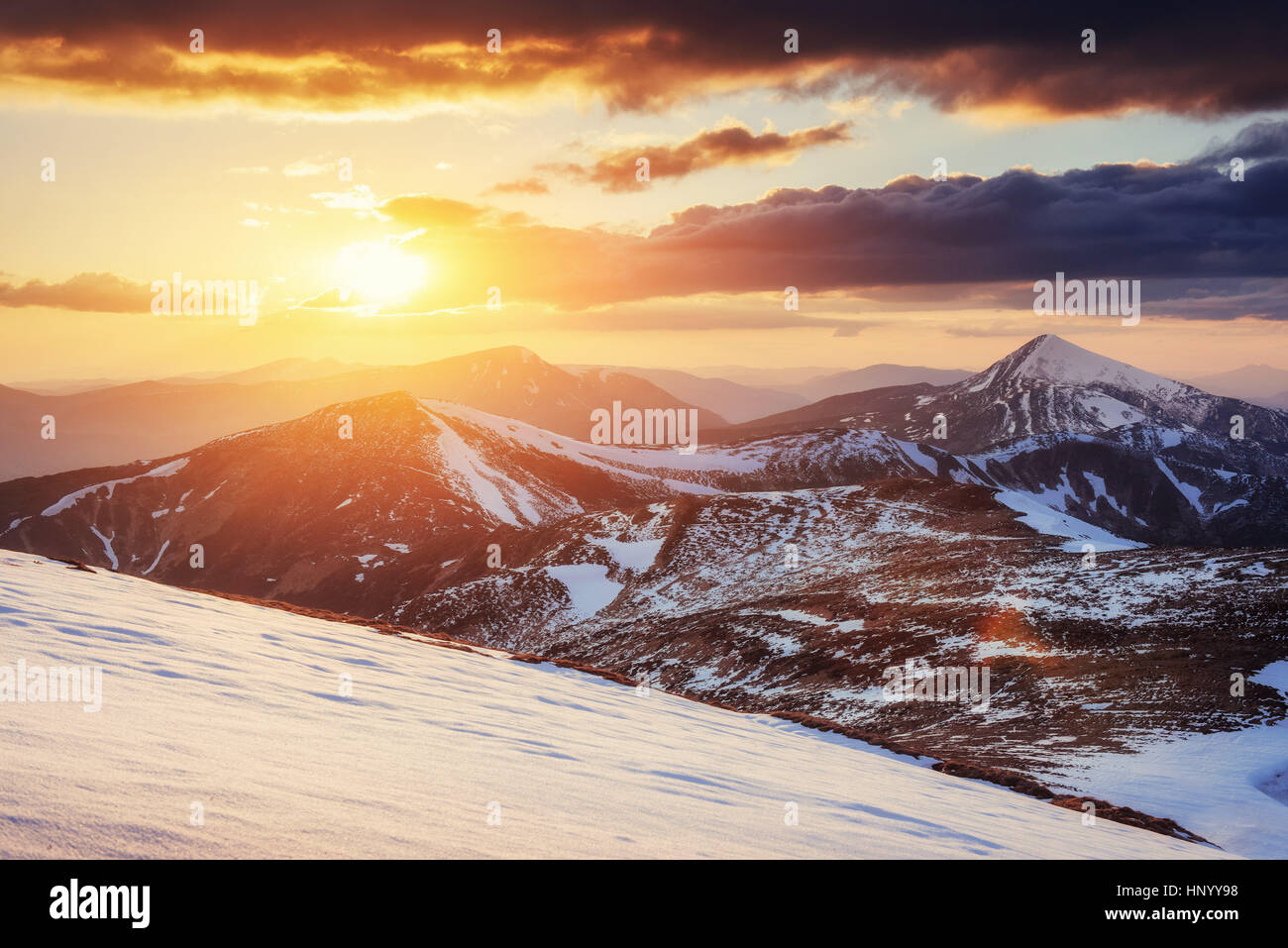 Colorful spring sunset over the mountain ranges in the national Stock ...