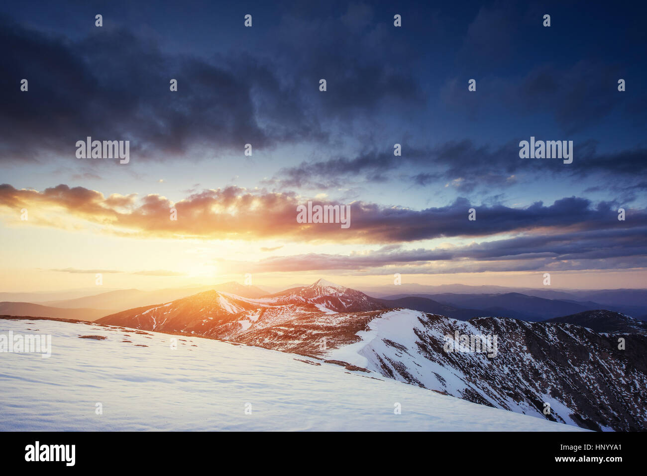Colorful spring sunset over the mountain ranges in the national park ...