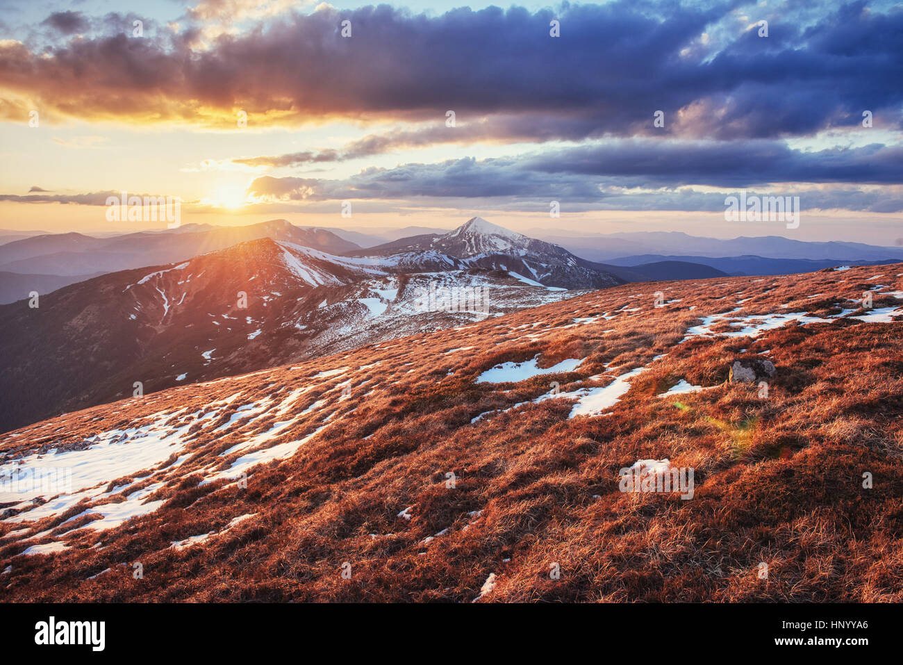 Colorful spring sunset over the mountain ranges in the national Stock ...