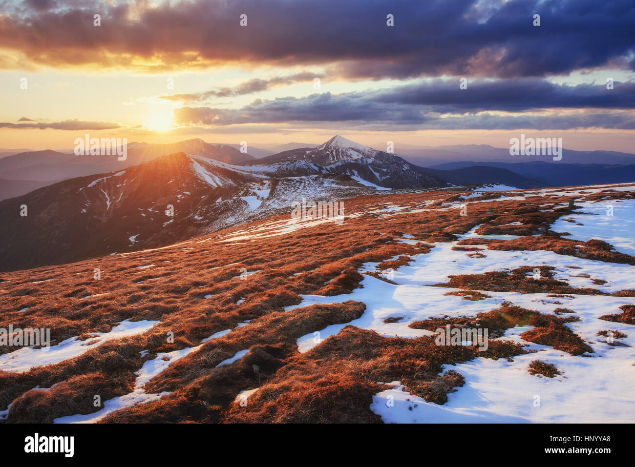 Colorful spring sunset over the mountain ranges in the national Stock ...