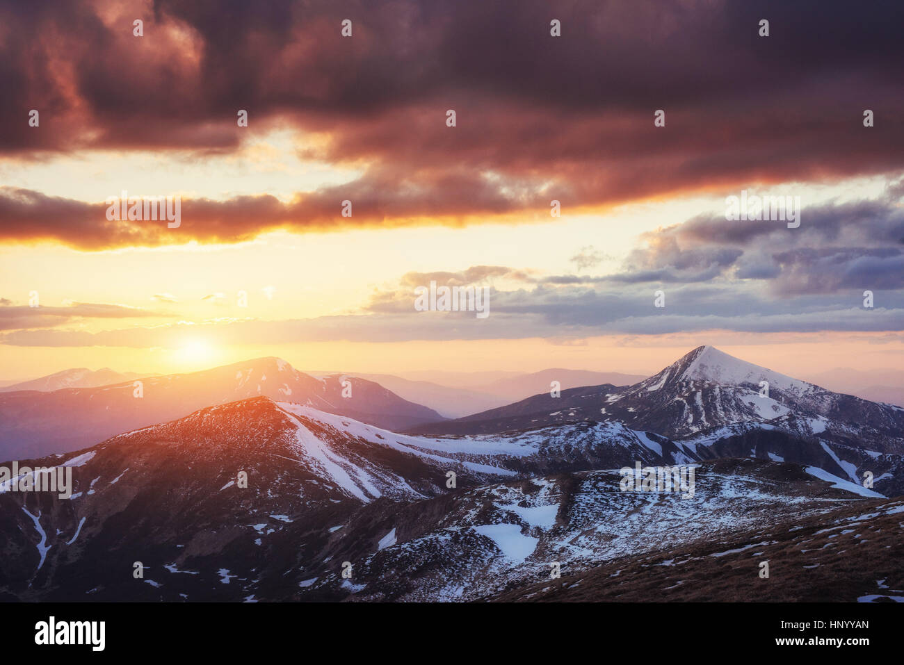 Colorful spring sunset over the mountain ranges in the national Stock ...