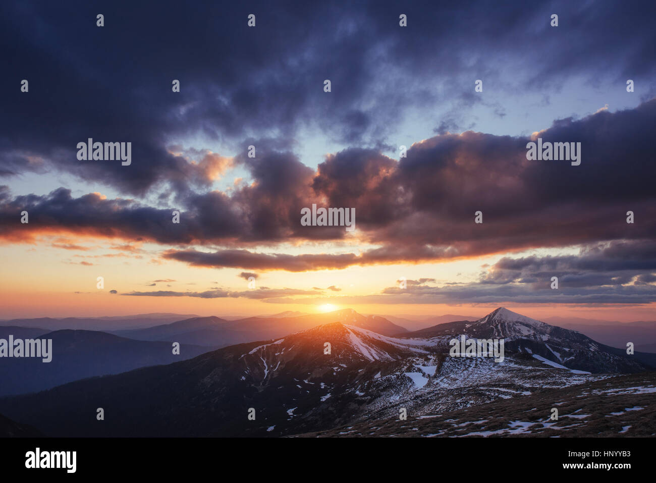 Colorful spring sunset over the mountain ranges in the national Stock ...