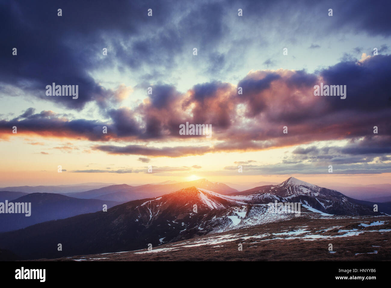 Colorful spring sunset over the mountain ranges in the national Stock ...