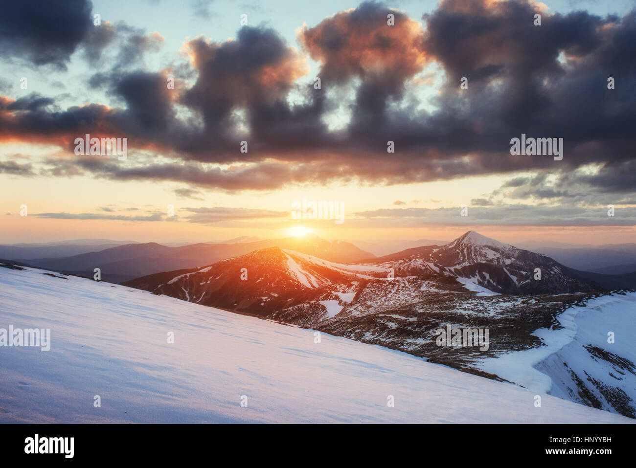 Colorful spring sunset over the mountain ranges in the national Stock ...