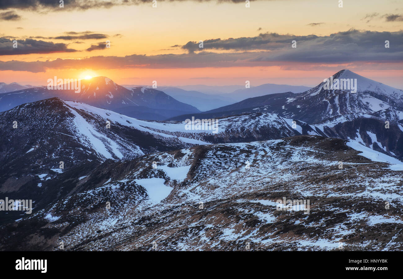 Colorful spring sunset over the mountain ranges in the national Stock ...