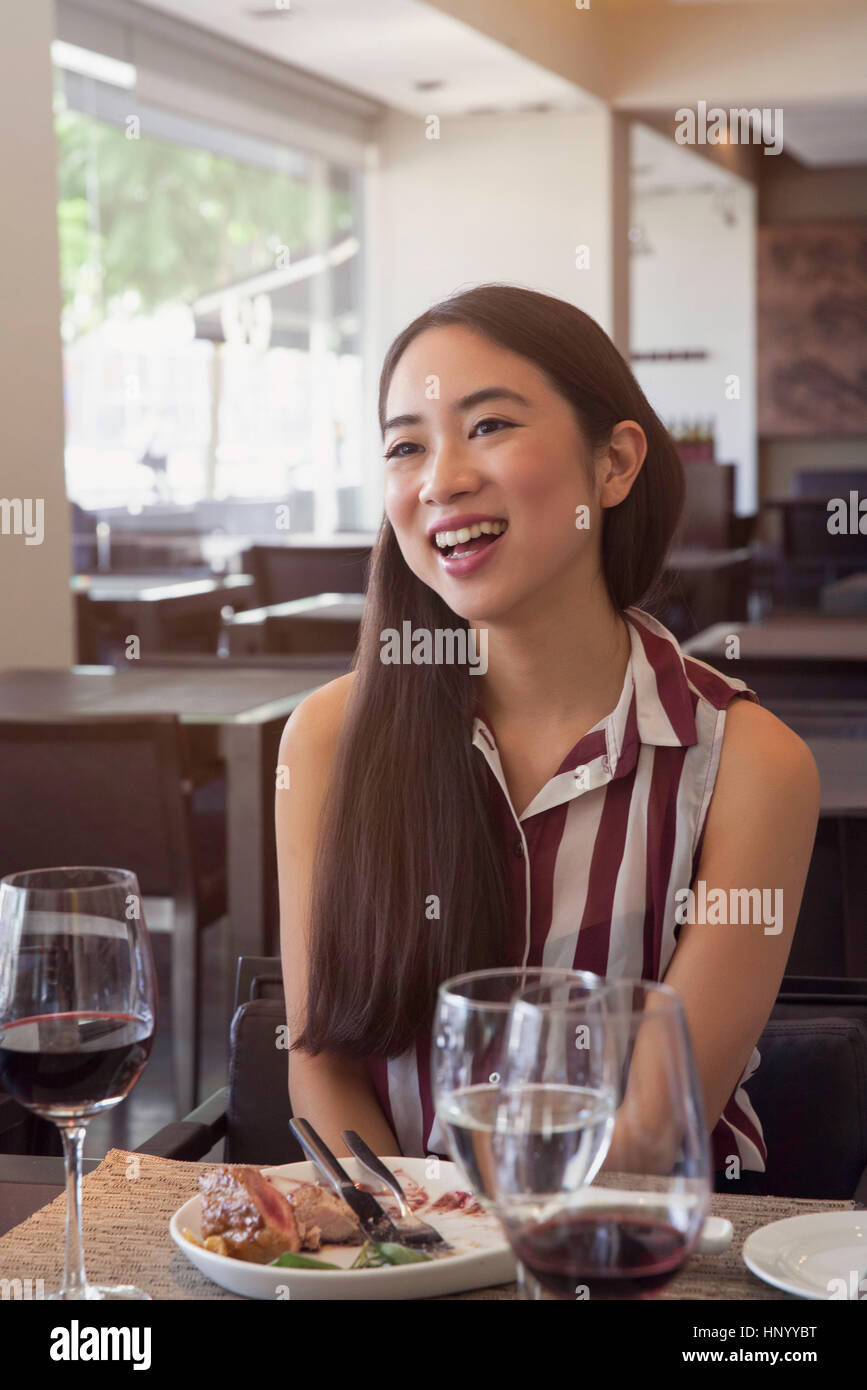 Young women eating restaurant interior hi-res stock photography and ...