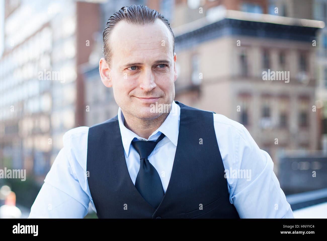 Businessman standing on stair hi-res stock photography and images - Alamy