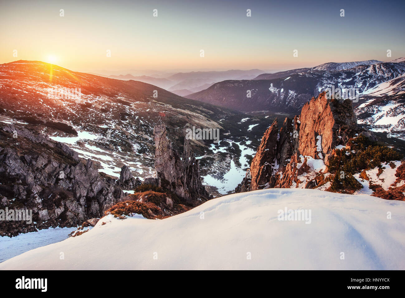Colorful spring sunset over the mountain ranges in the national Stock ...