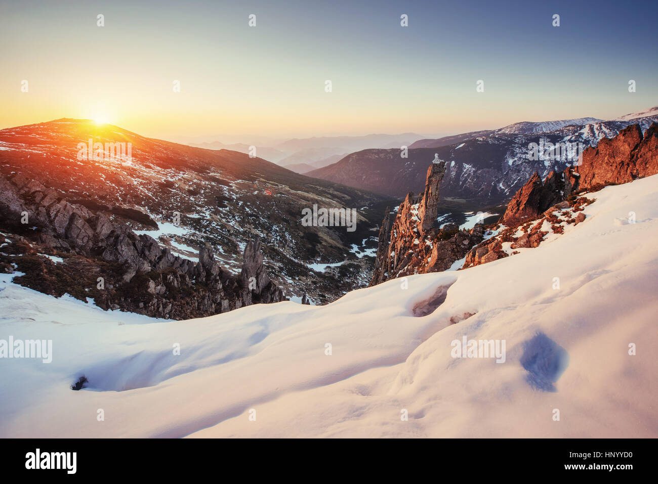 Colorful spring sunset over the mountain ranges in the national Stock ...