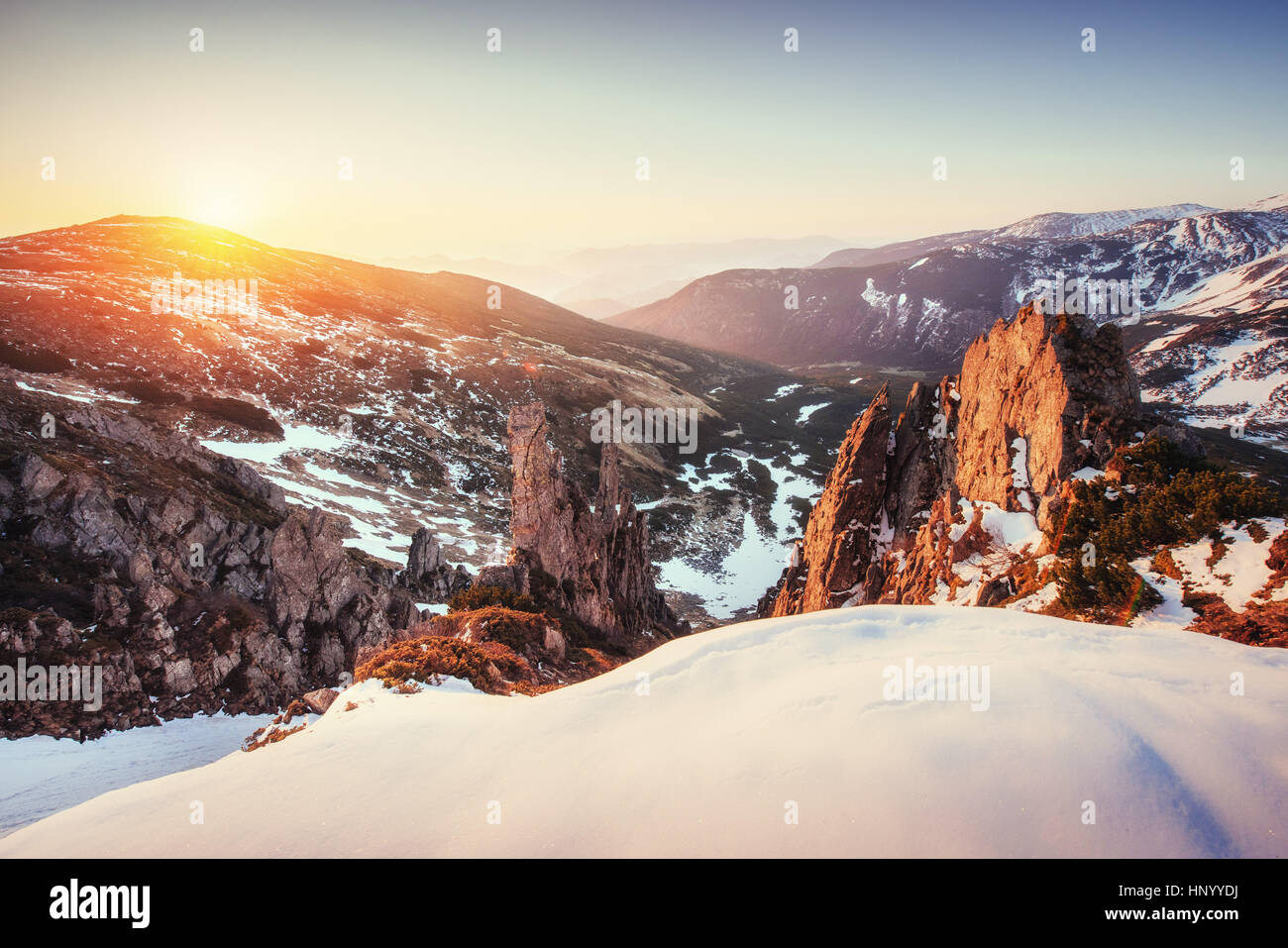 Colorful spring sunset over the mountain ranges in the national Stock ...