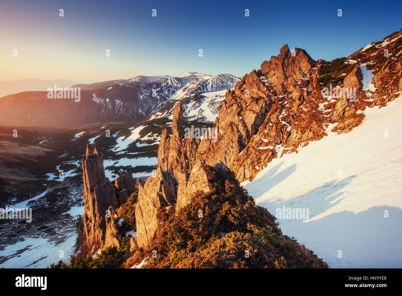 Colorful spring sunset over the mountain ranges in the national Stock ...