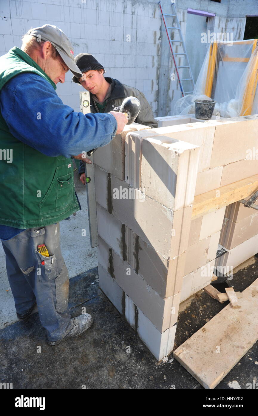 Two Bricklayers High Resolution Stock Photography and Images - Alamy