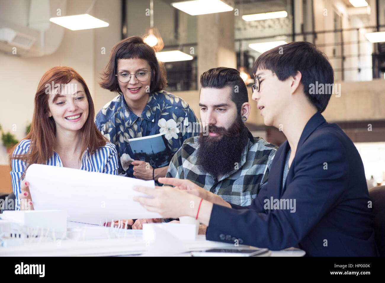 Team of architects collaborating on a project Stock Photo - Alamy