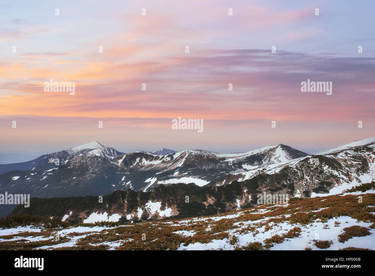 Colorful spring sunset over the mountain ranges in the national Stock ...