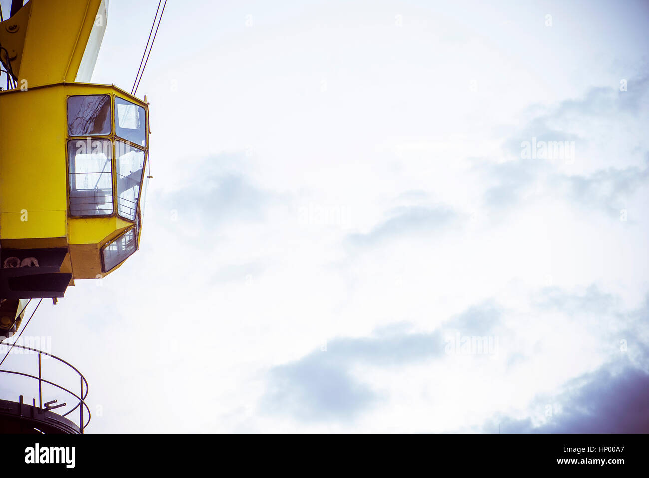 Crane control booth frame against morning sky Stock Photo - Alamy