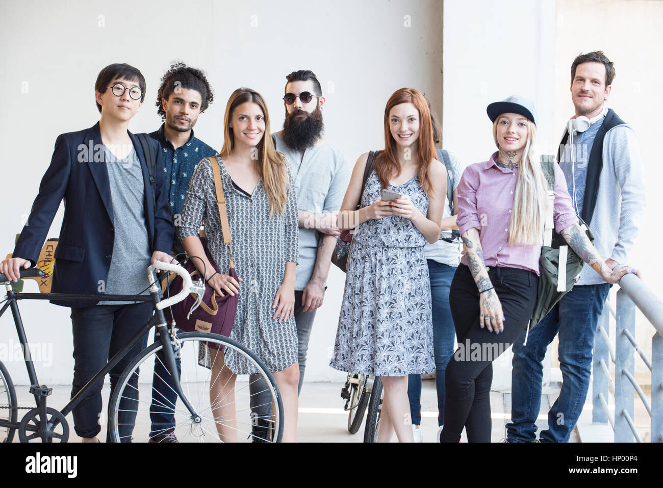 Group of hipsters standing together outdoors Stock Photo - Alamy