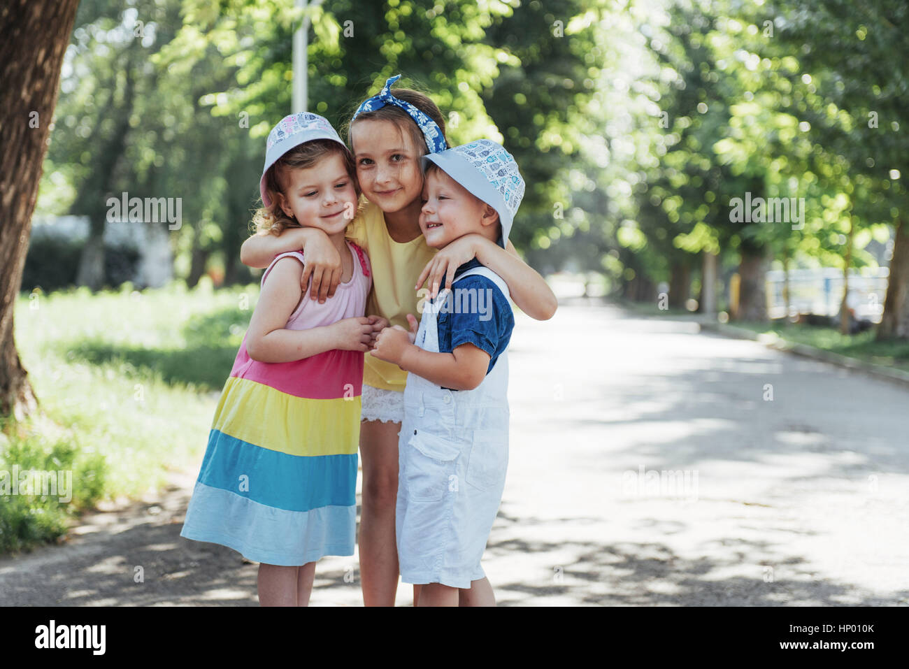 Lovely cute kids playing in the park a beautiful summer Stock Photo - Alamy