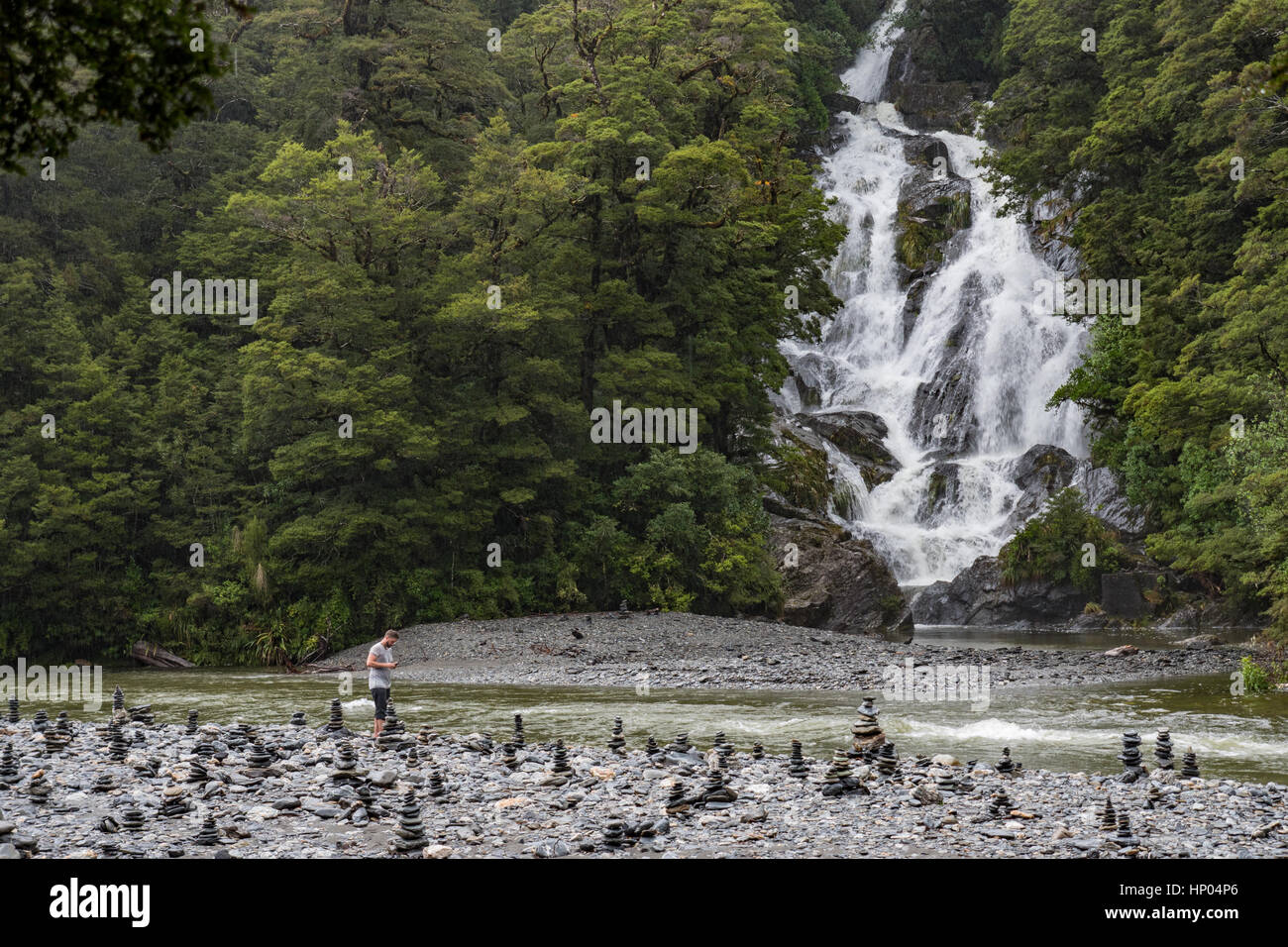 Fantail Falls and pebble stacks off the Haast Highway, Mount Aspiring ...