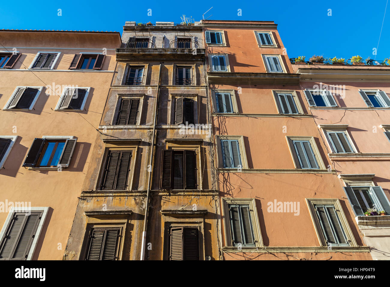 Facade of classical buildings in the historical center of Rome, Italy ...