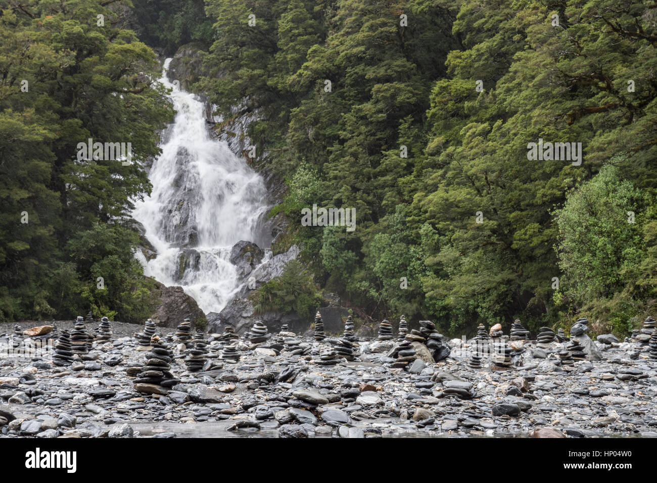 Fantail Falls and pebble stacks off the Haast Highway, Mount Aspiring ...