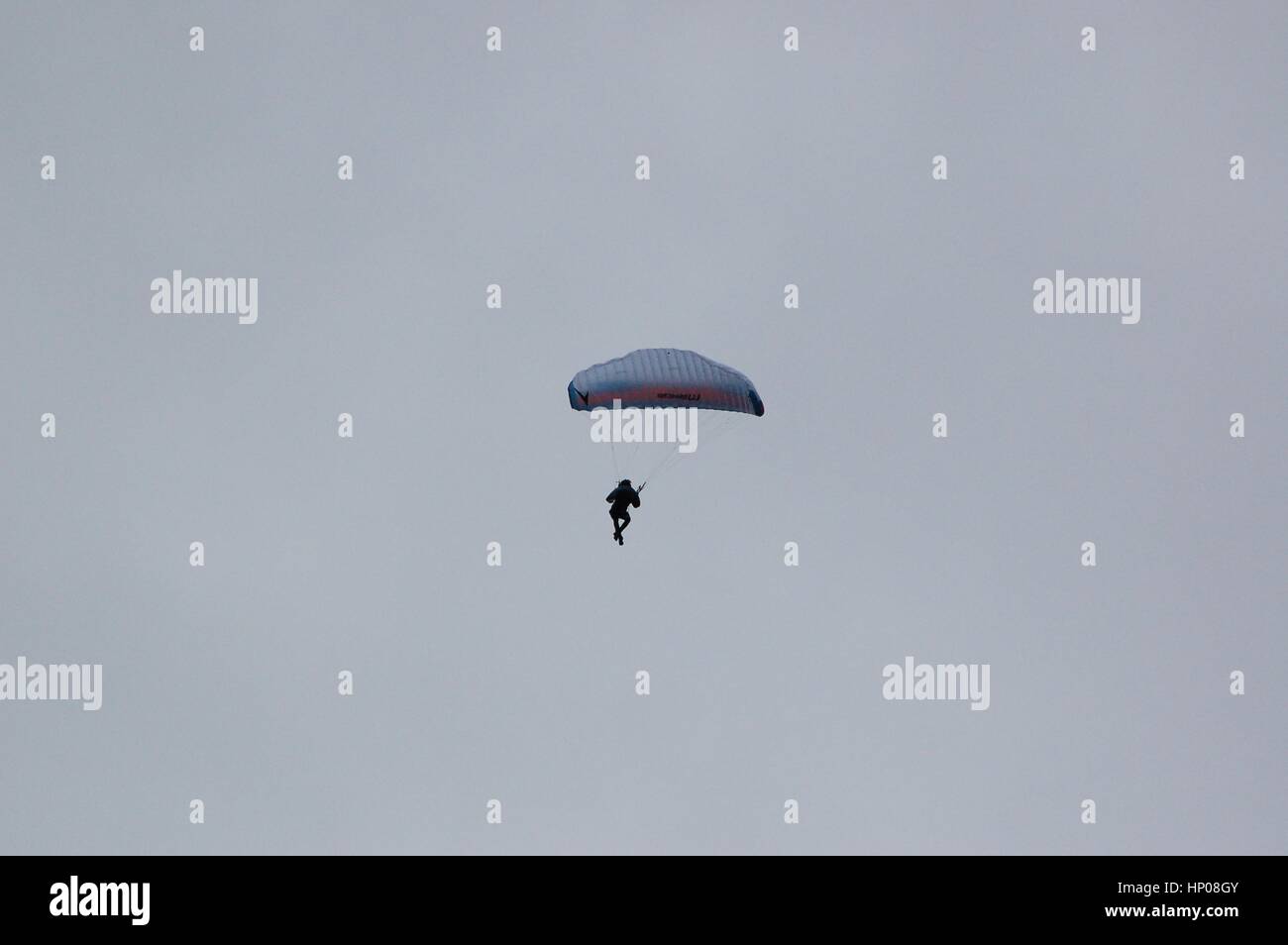 BASE jumpers launching themselves off of the cliffs of Kjerag in ...