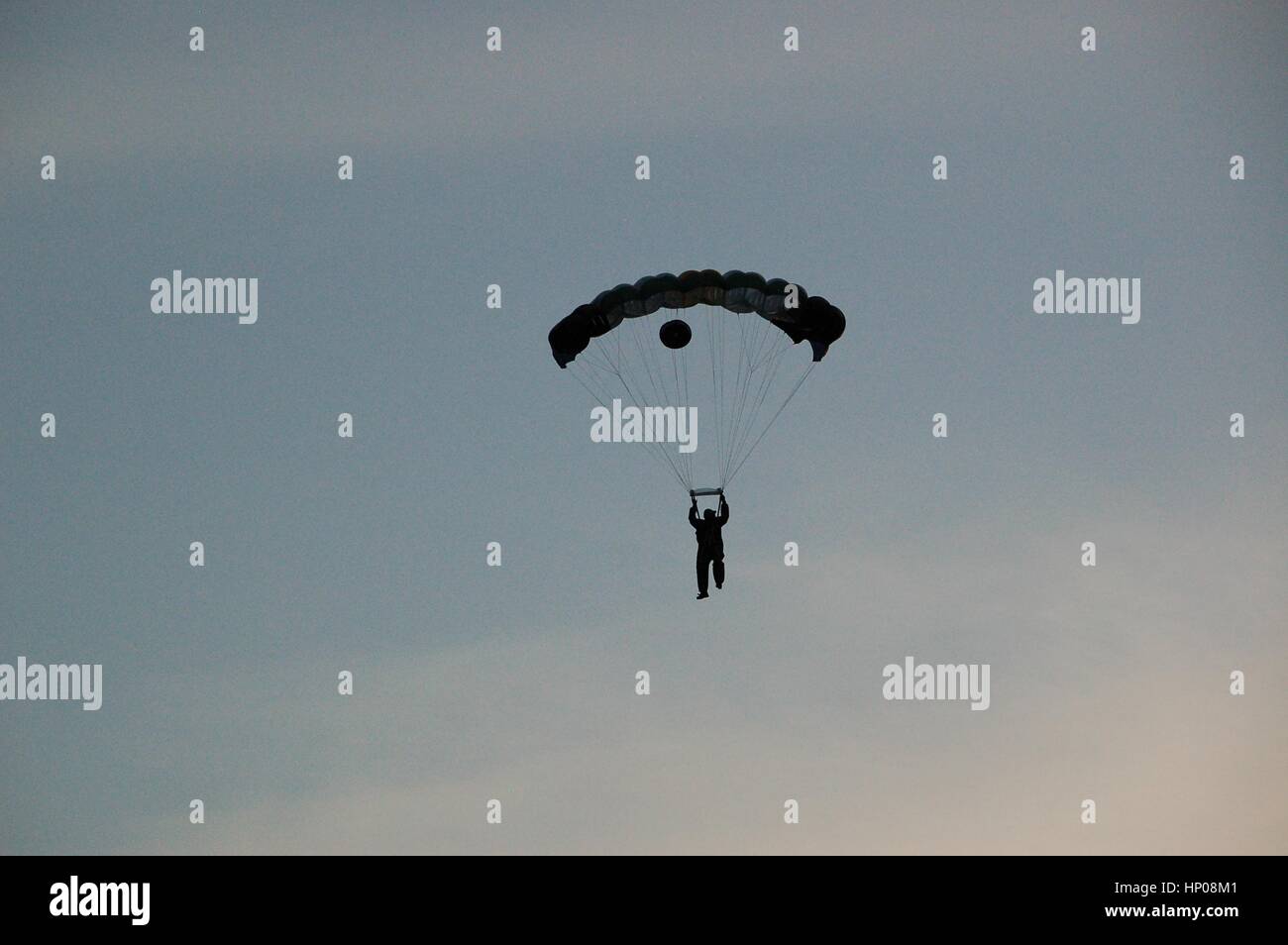 BASE jumpers launching themselves off of the cliffs of Kjerag in ...