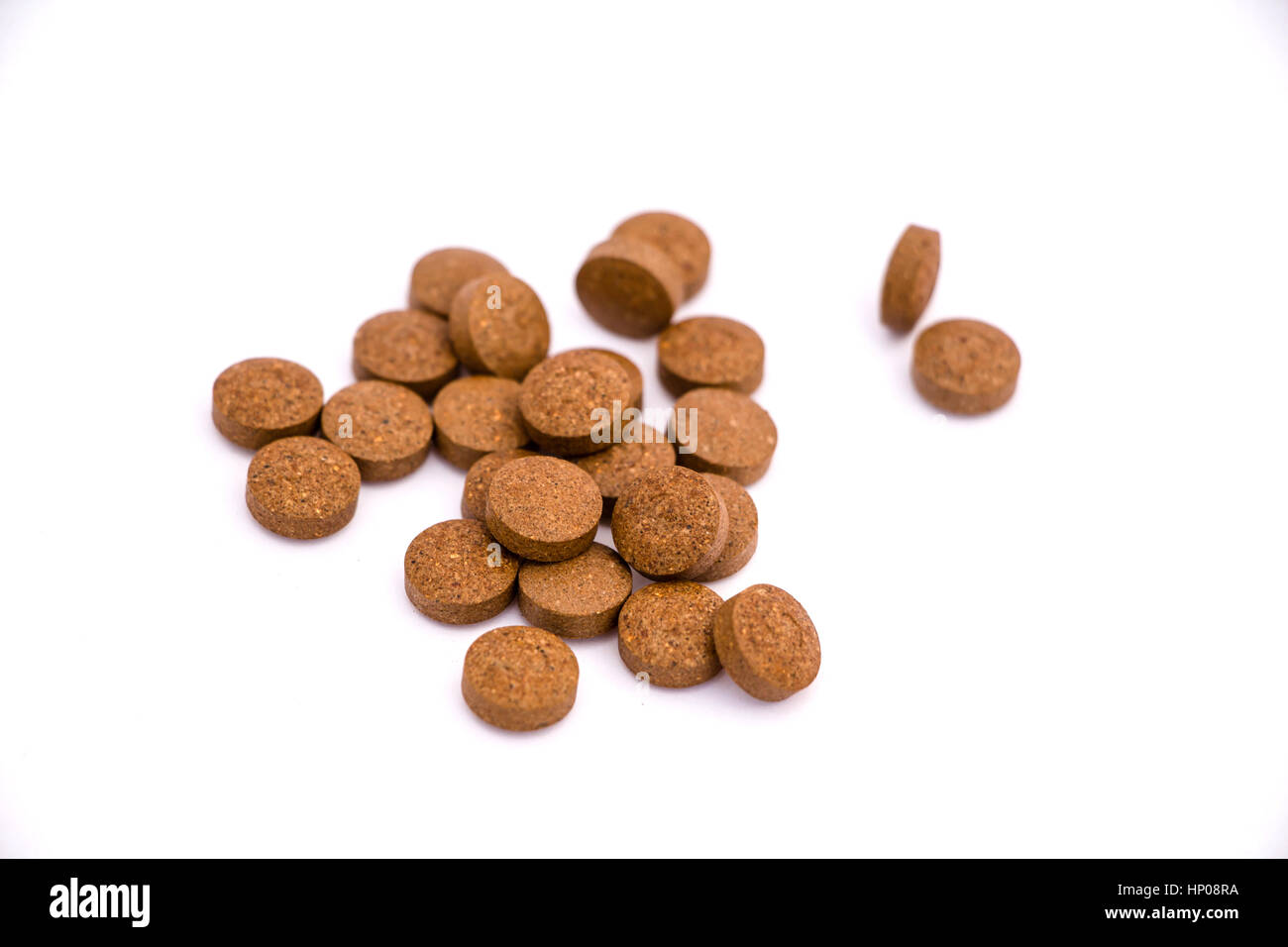 Bronw Tablet on white background Stock Photo - Alamy