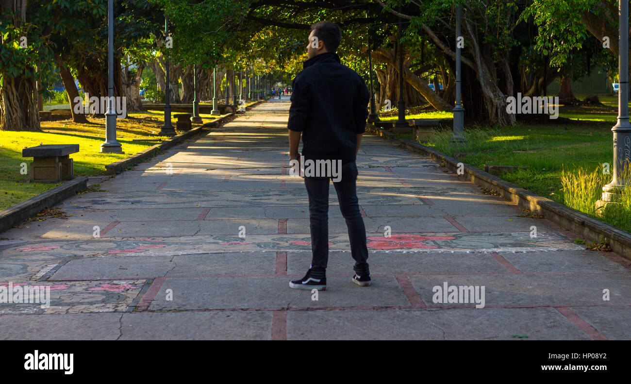 Guy at a park Stock Photo - Alamy