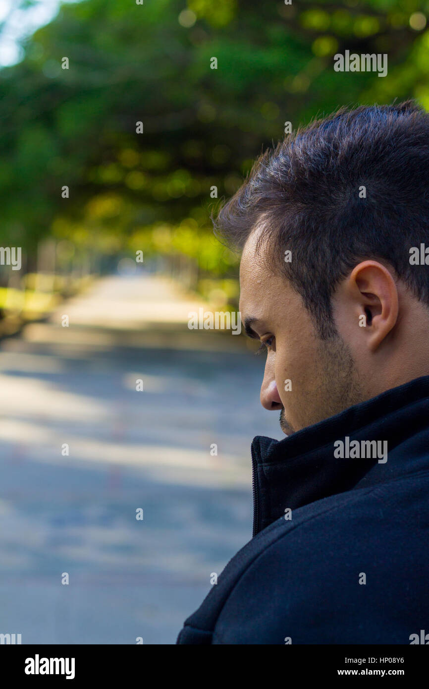 Guy at a park Stock Photo - Alamy