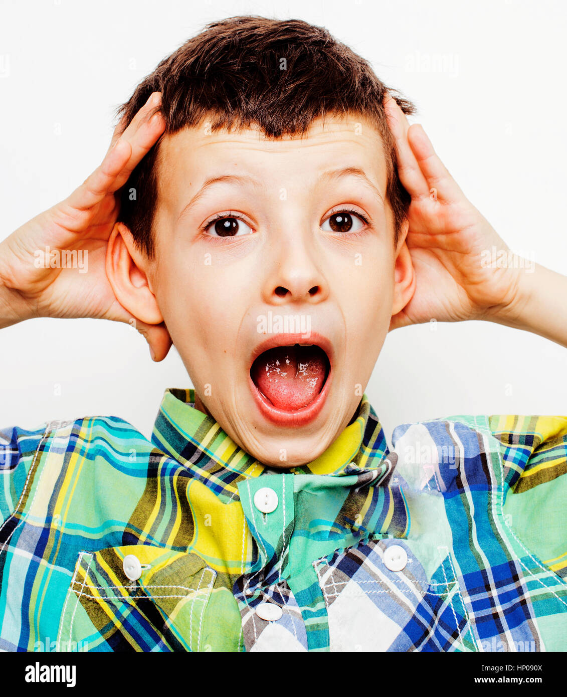 young pretty little cute boy kid wondering, posing emotional face ...