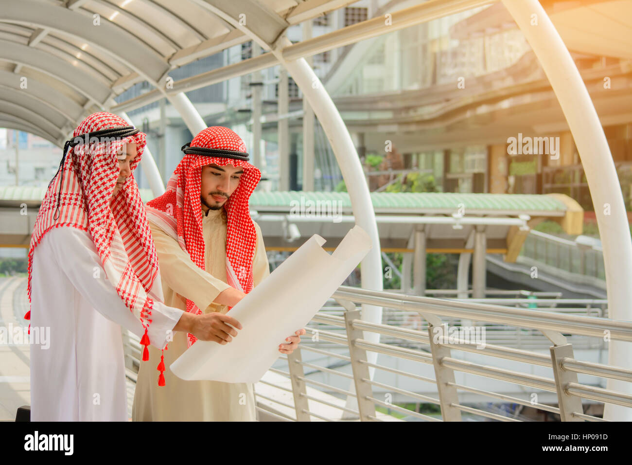 Arab Business people having consultanting about new project with city ...