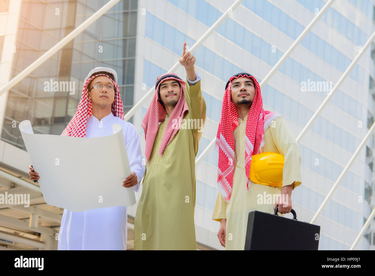 Arab Business people having consultanting about new project with city ...